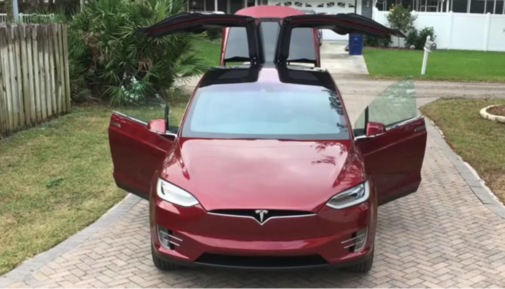 Check out the doors of Tesla Model X responding to the push of a button ...